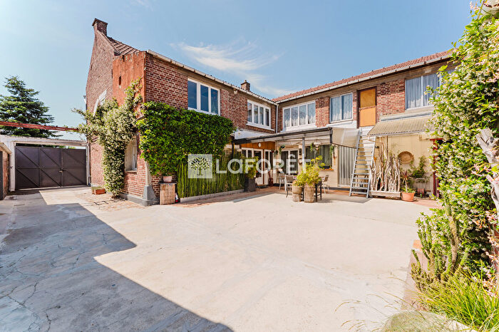 Maison 11 pièces à Évin-Malmaison, à vendre